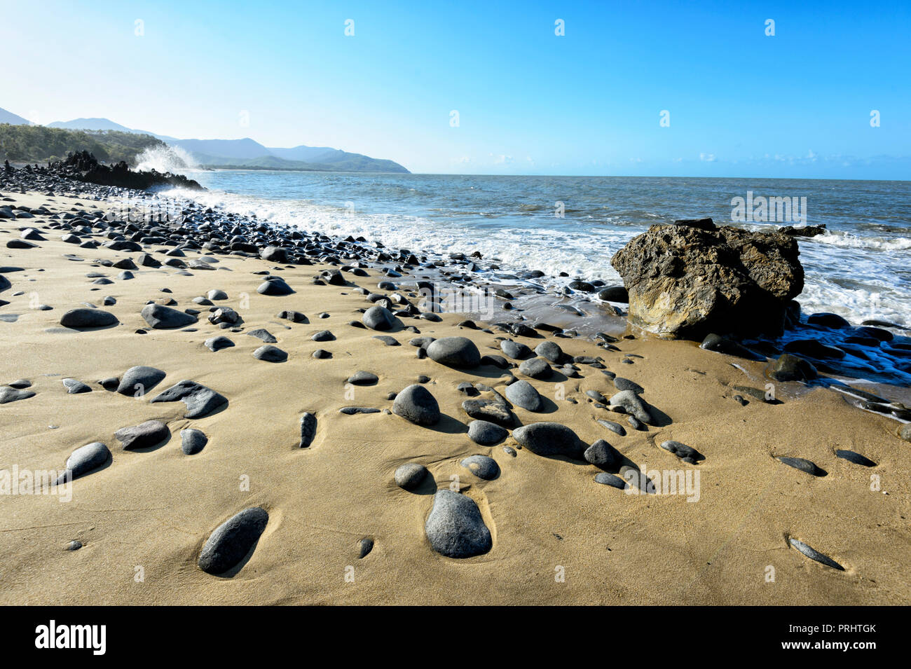 Scenic rocky coastline along the Cpt Cook Highway between Port Douglas ...