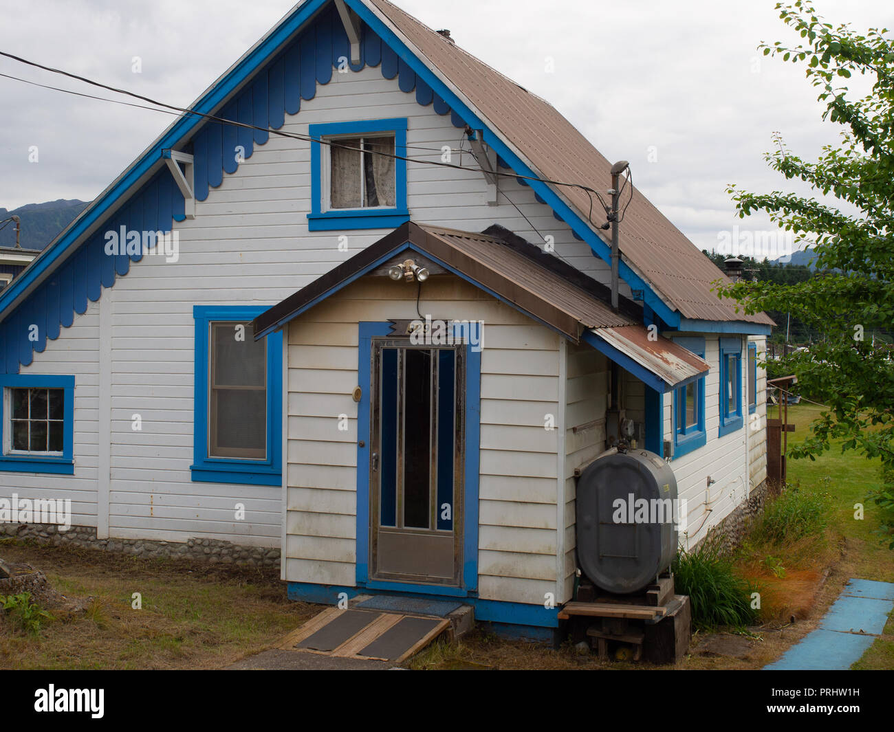 White And Blue House In Hoonah Stock Photo - Alamy