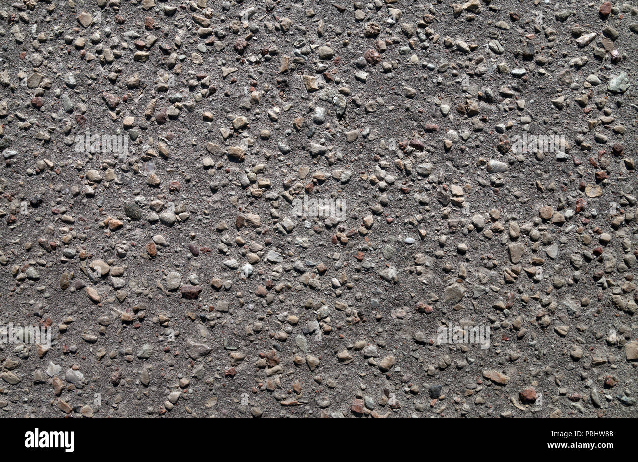 Asphalt road surface with small stones Stock Photo - Alamy