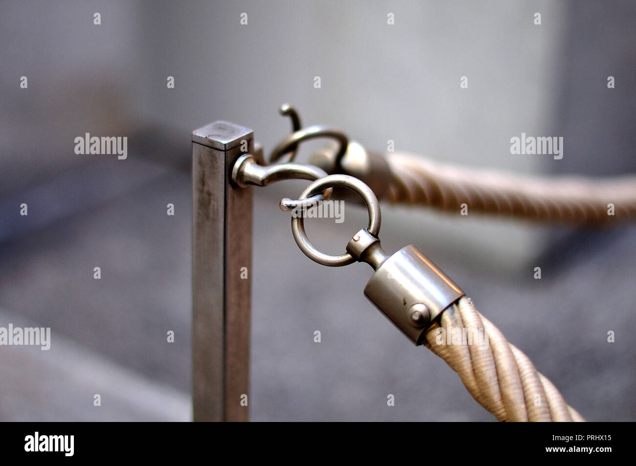 silk ropes fixed at hooks on a rectangular tube of steel Stock Photo ...