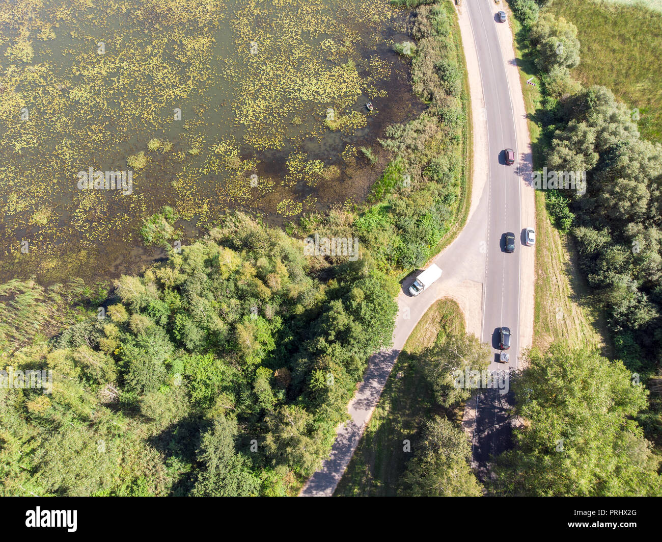 Green landscape road cars hi-res stock photography and images - Alamy