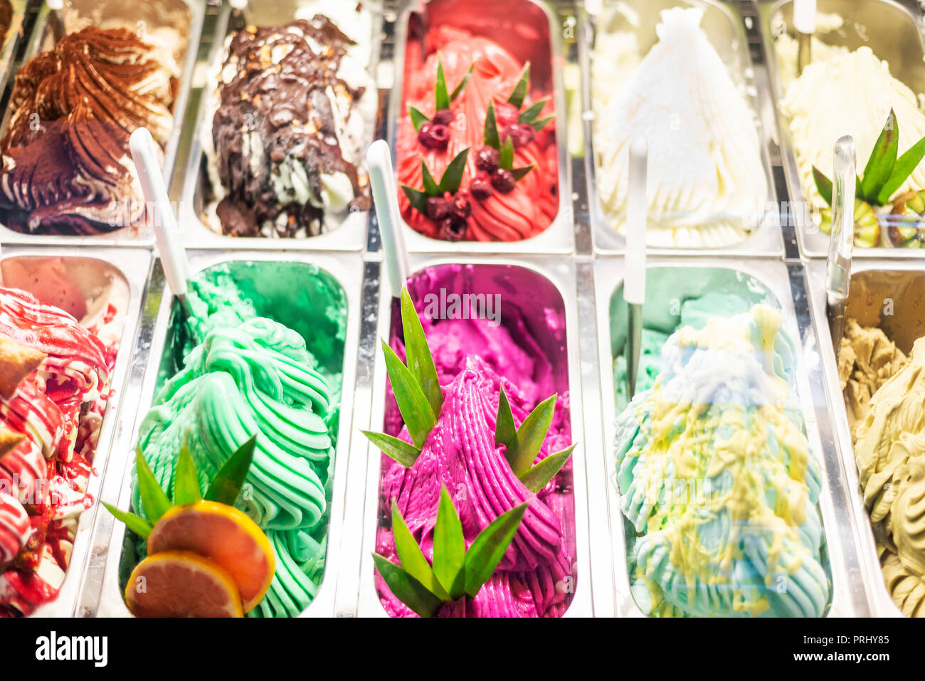 various italian gelato ice cream flavours in modern shop display window ...