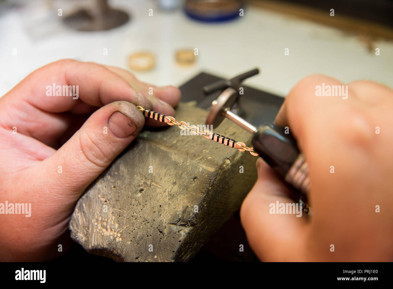 jeweler hands at work Stock Photo - Alamy