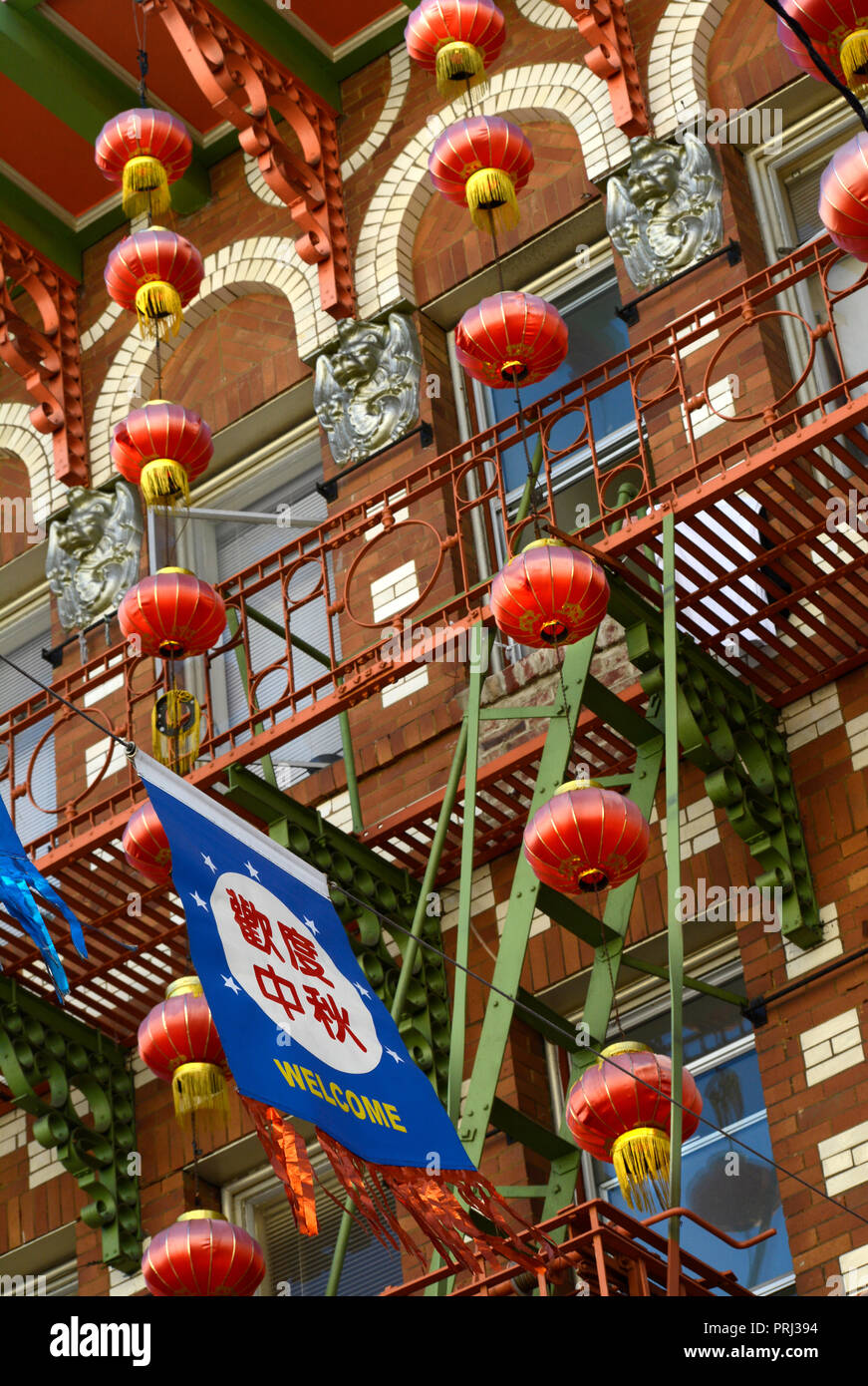 Chinese lanterns hang from a building along Grant Avenue in Chinatown ...