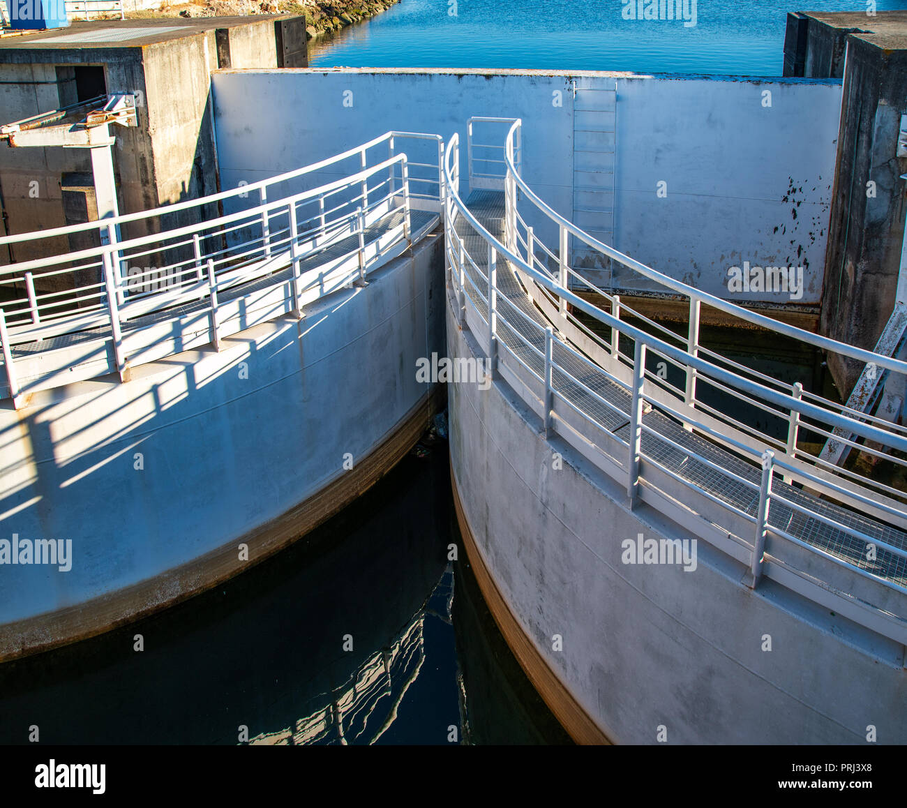 metal damm structure pier for stopping the water Stock Photo - Alamy