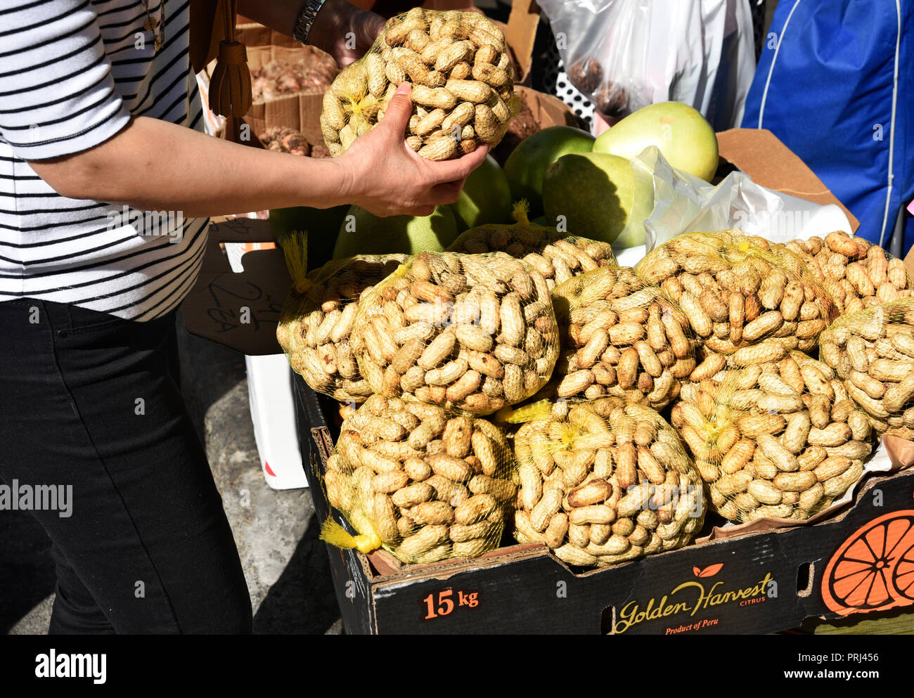 Bags of raw peanuts for sale in Chinatown, San Francisco, California ...