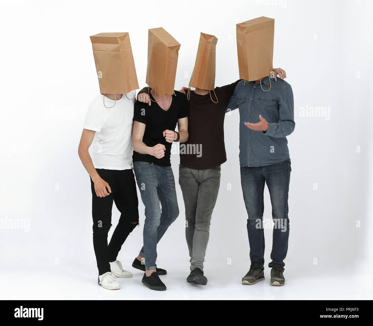 group of young people with paper bags on their heads Stock Photo - Alamy