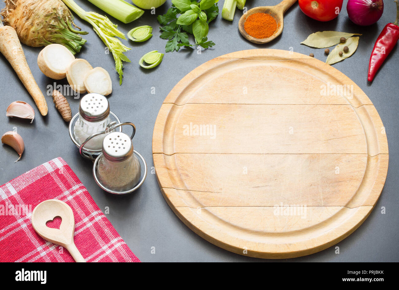 Cooking in the kitchen food background concept with spices vegetables ...