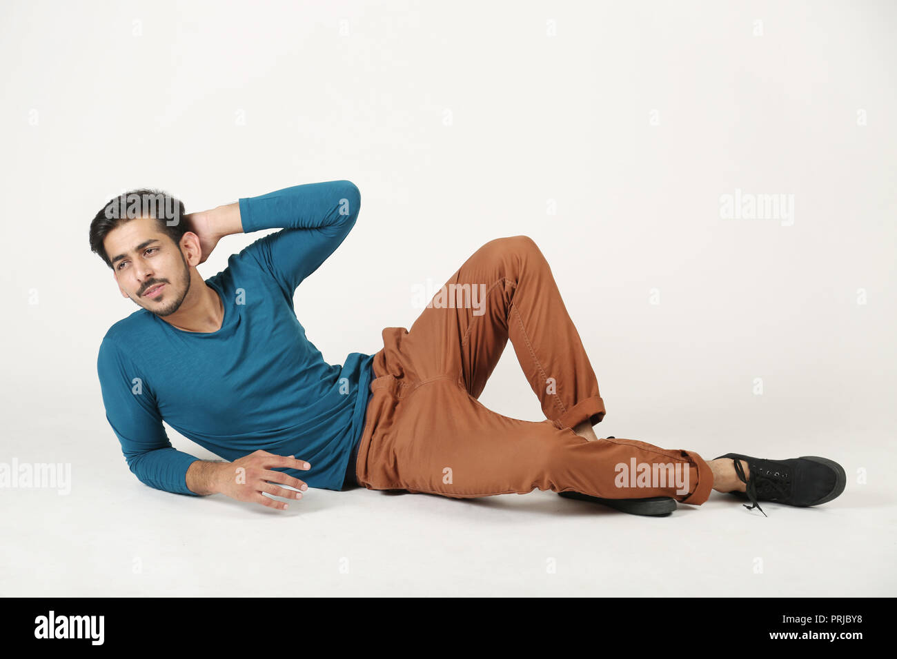 Handsome boy is relaxing in picture. Isolated on white background Stock ...