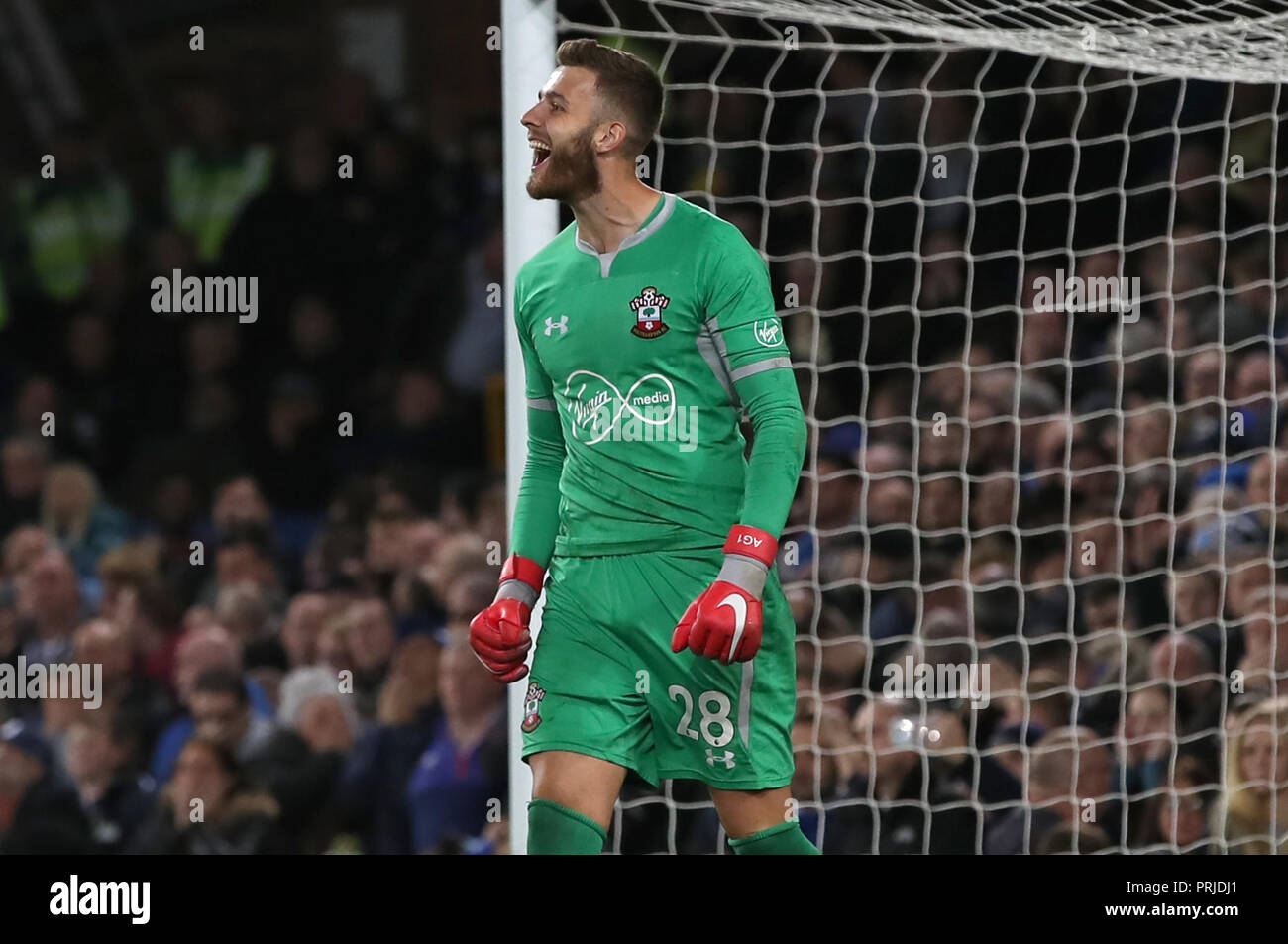 Southampton goalkeeper angus gunn reacts hi-res stock photography and ...