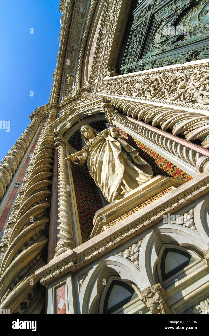 Statue on facade florence cathedral hi-res stock photography and images ...