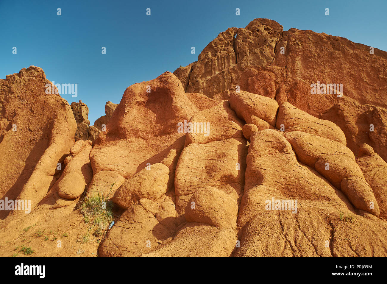 Fairy Tale Canyon, rock formations on the Issyk-Kul lake. Kyrgyzstan ...