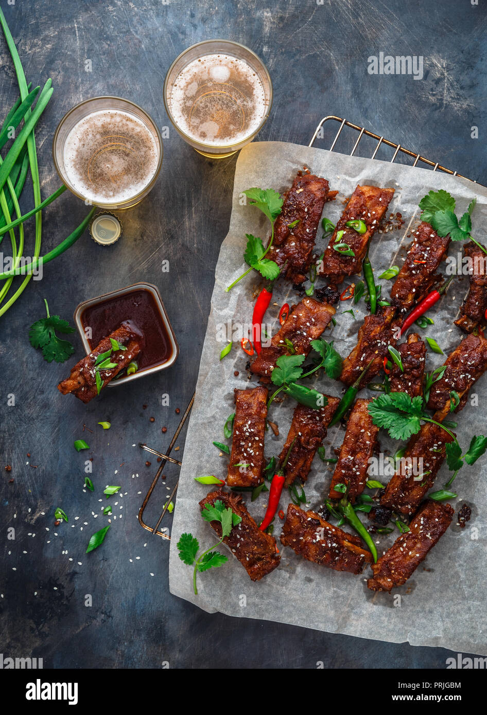 Spicy bbq ribs with chili, coriander and beer Stock Photo - Alamy