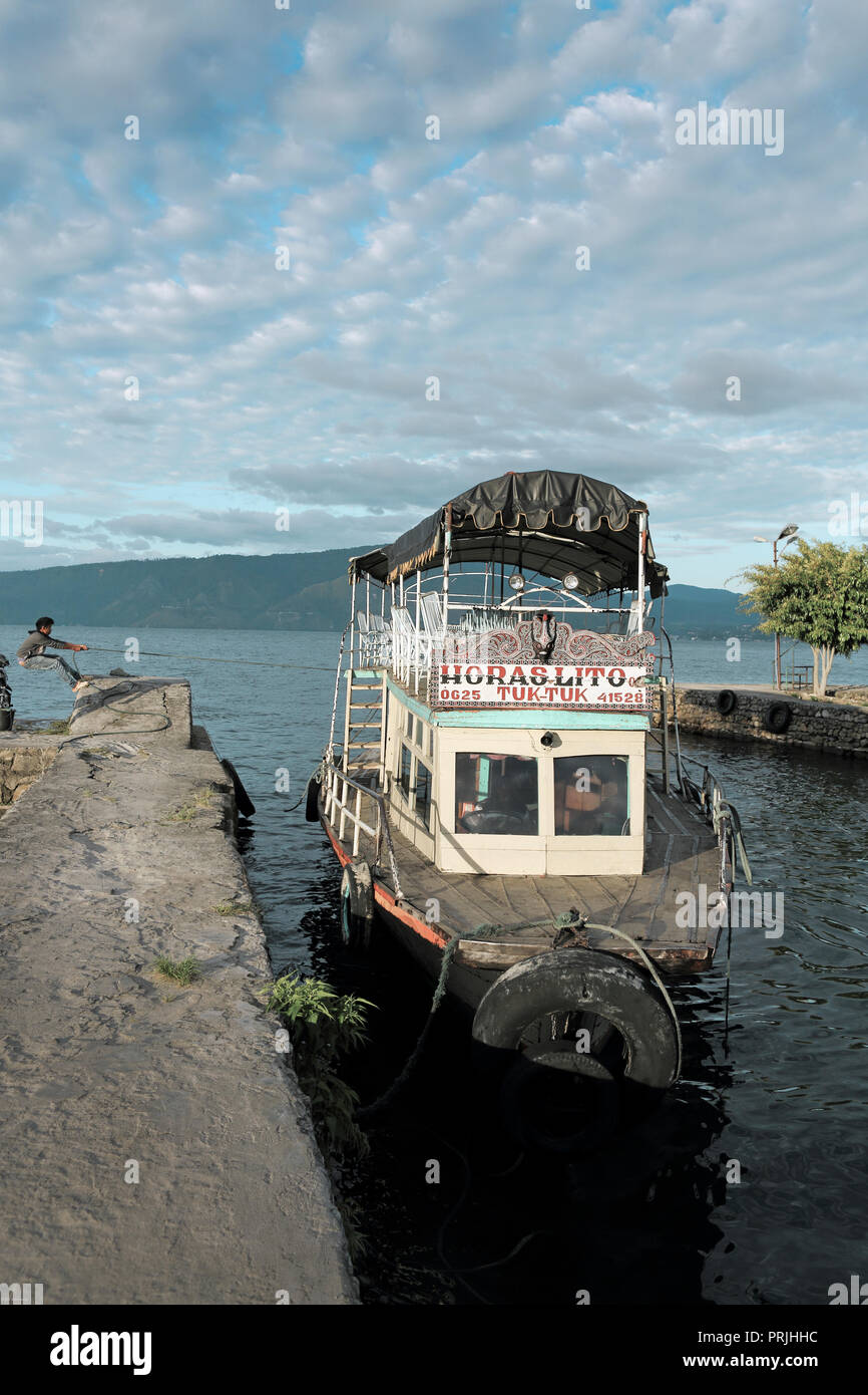 Wooden ferry boat at Samosir Island on Lake Toba, Sumatra, Indonesia ...