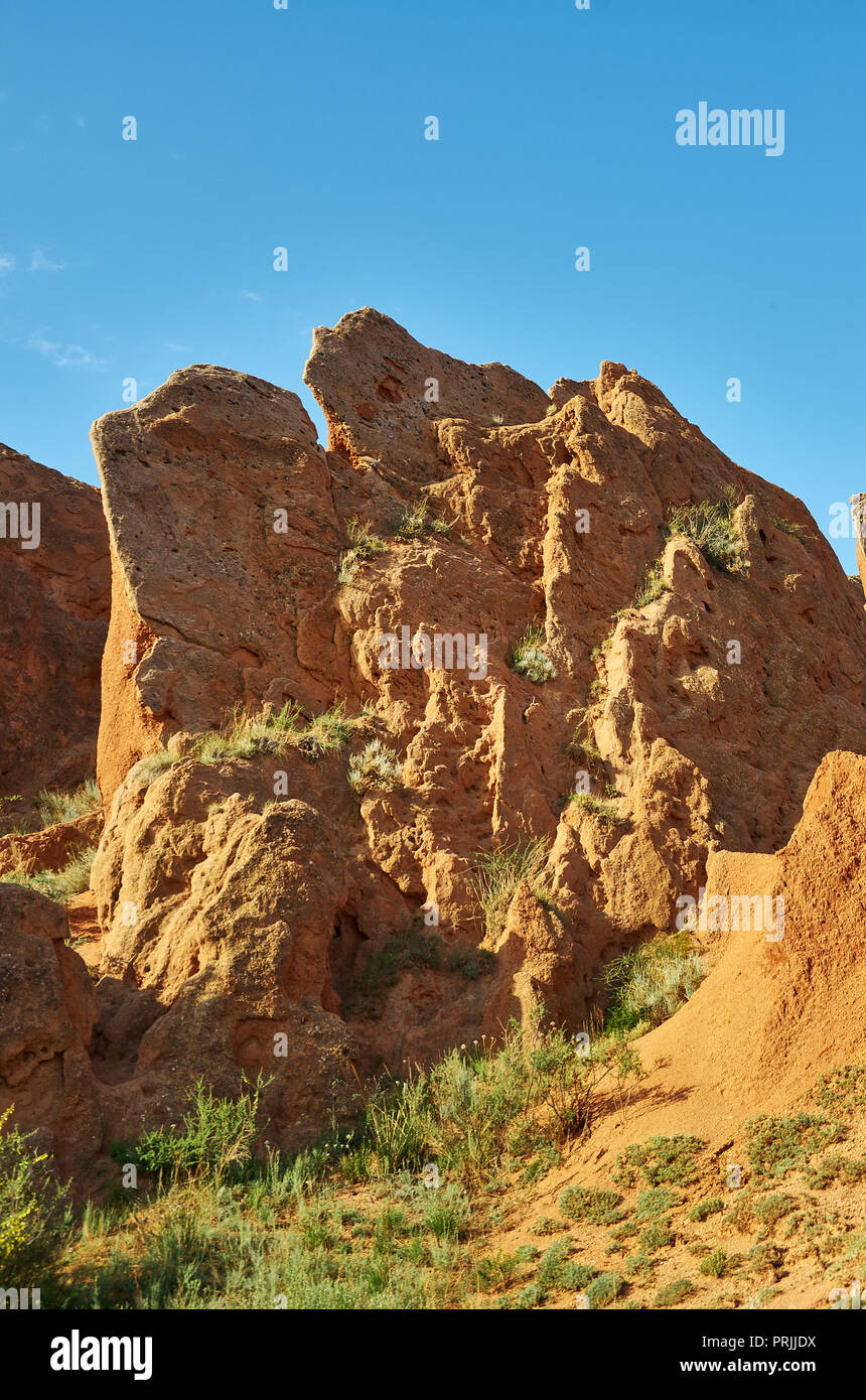 Fairy Tale Canyon, rock formations on the Issyk-Kul lake. Kyrgyzstan ...