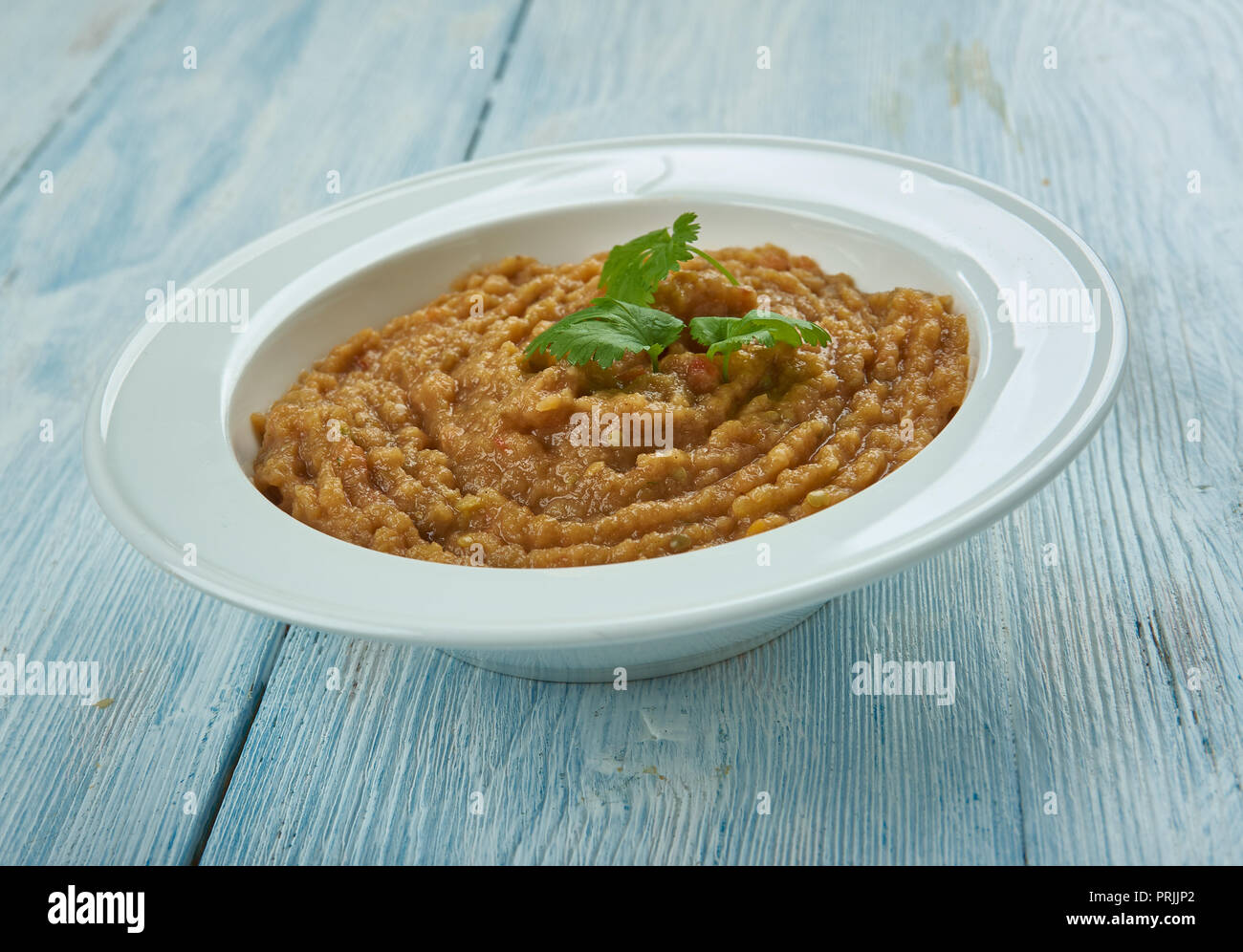Baba ghanoush, Levantine dish of mashed, cooked eggplant that is mixed ...