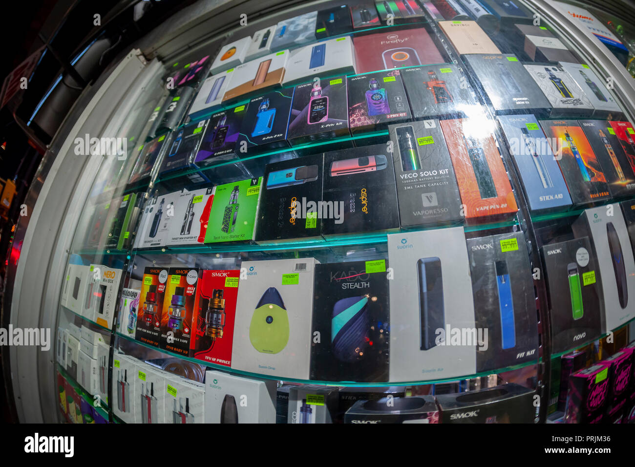 A selection of vaping supplies on display in the window of a vaping ...