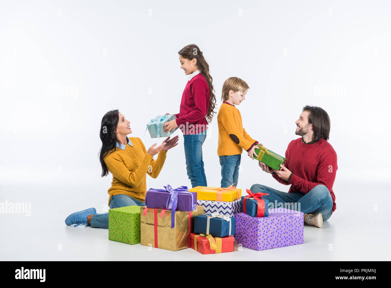 smiling family with wrapped presents isolated on white Stock Photo - Alamy