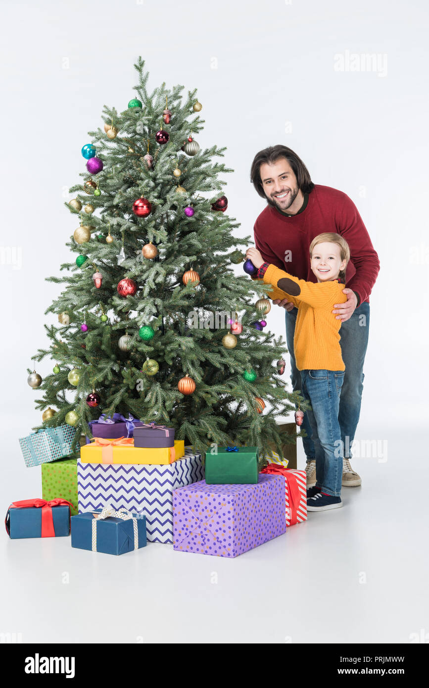 Father son decorate christmas tree hi-res stock photography and images ...