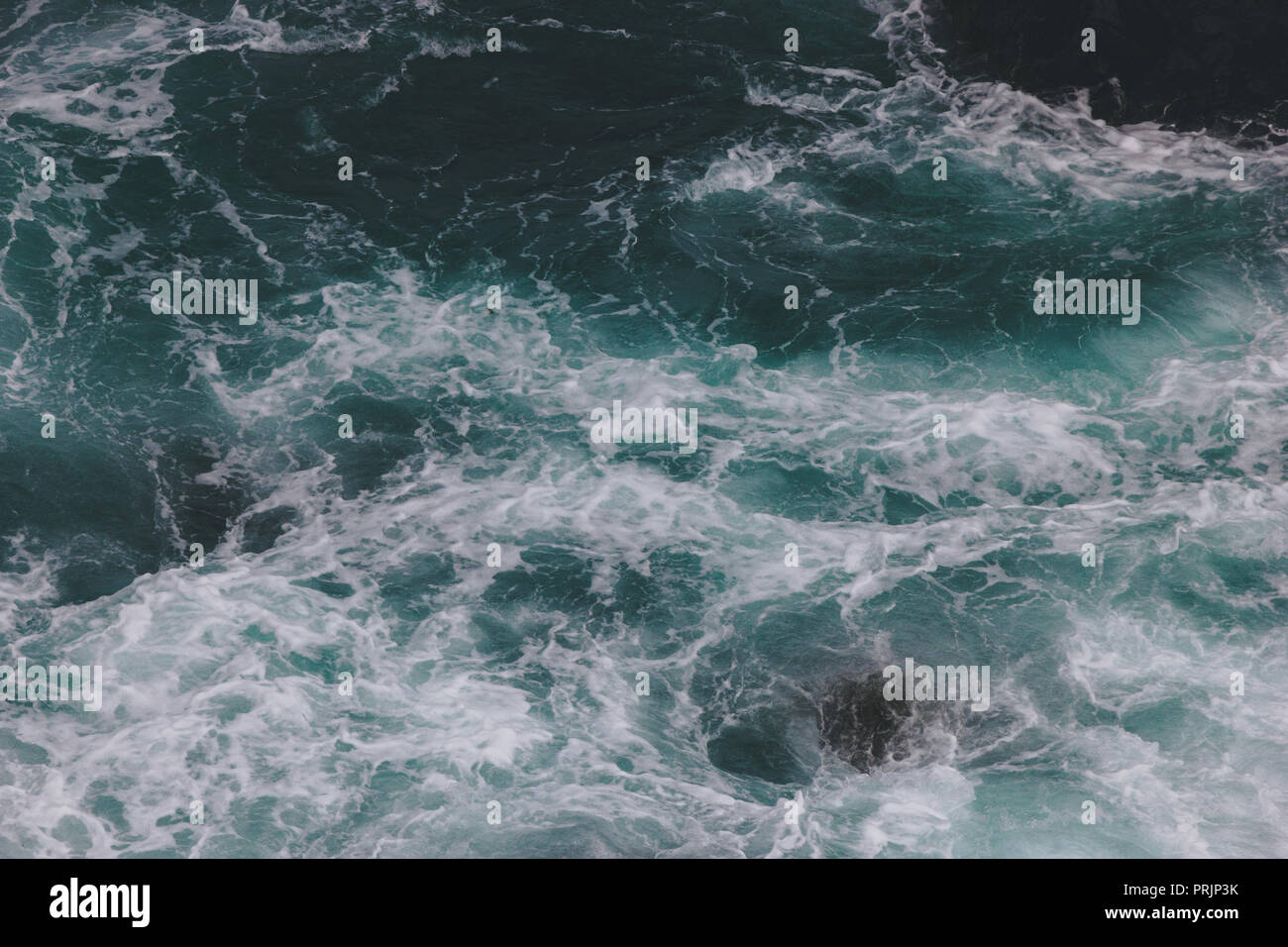 top view shot of wavy blue ocean for background Stock Photo - Alamy