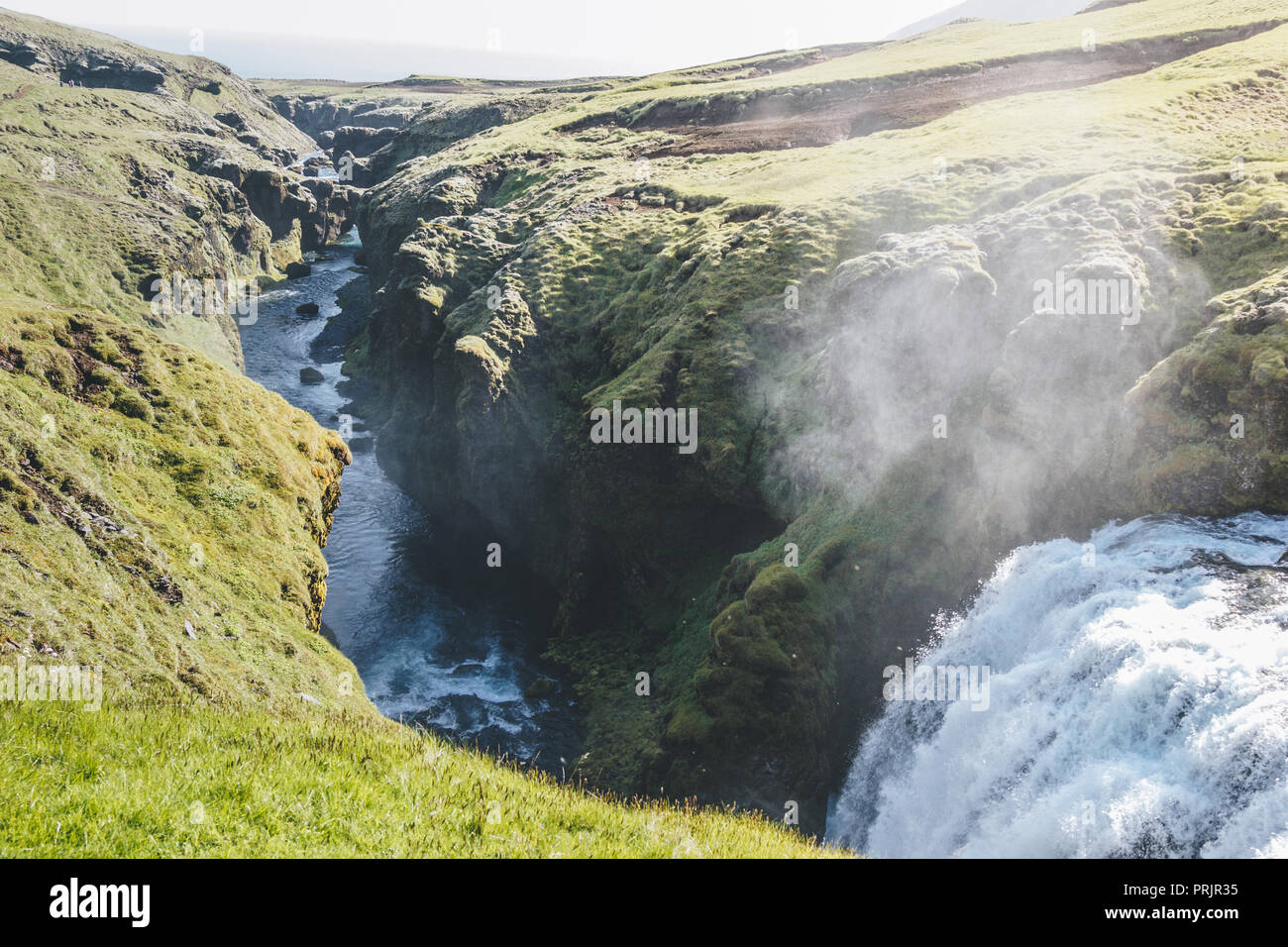aerial view of waterfall on Skoga river flowing through highlands in ...
