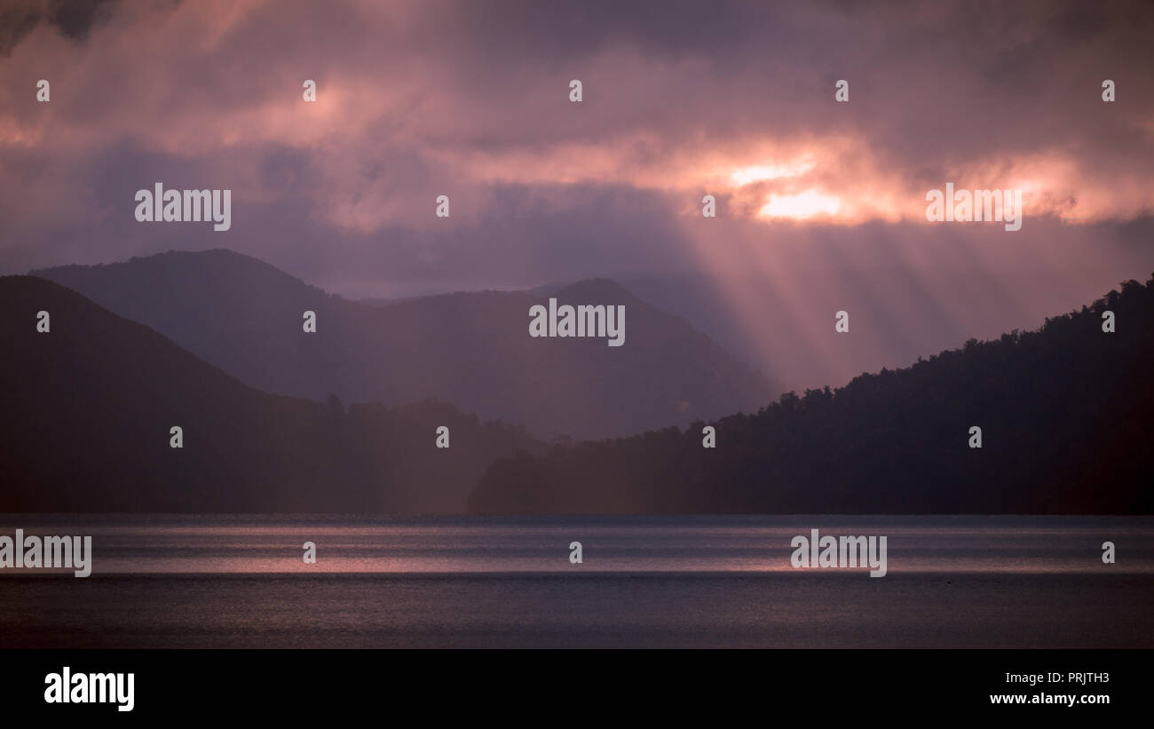 Sun beaming through clouds hi-res stock photography and images - Alamy