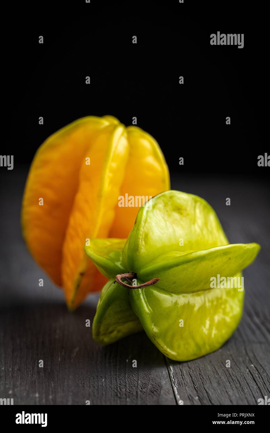 ripe yellow and green star fruit carambola or star apple ( starfruit ...