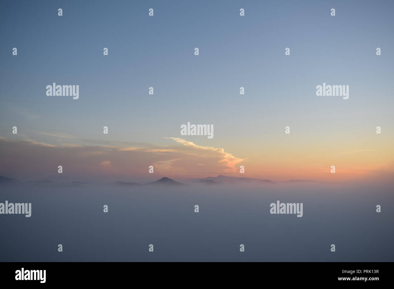 sun, sunrise with dense fog and blue sky background at dawn Stock Photo ...