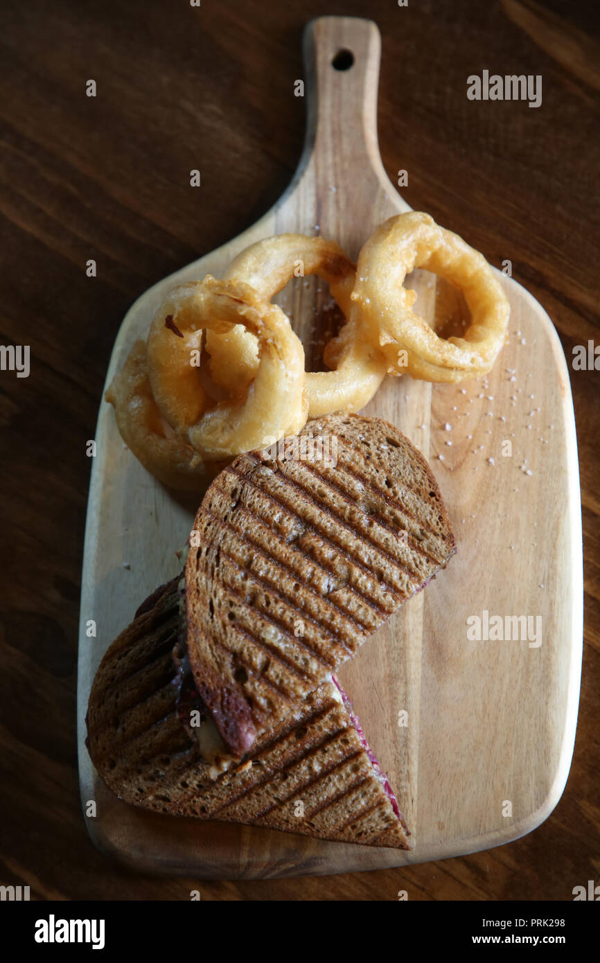 Pictured: Sandwich or toastie and onion rings at Jack & Knife restaurant at 76 Stanley St ...