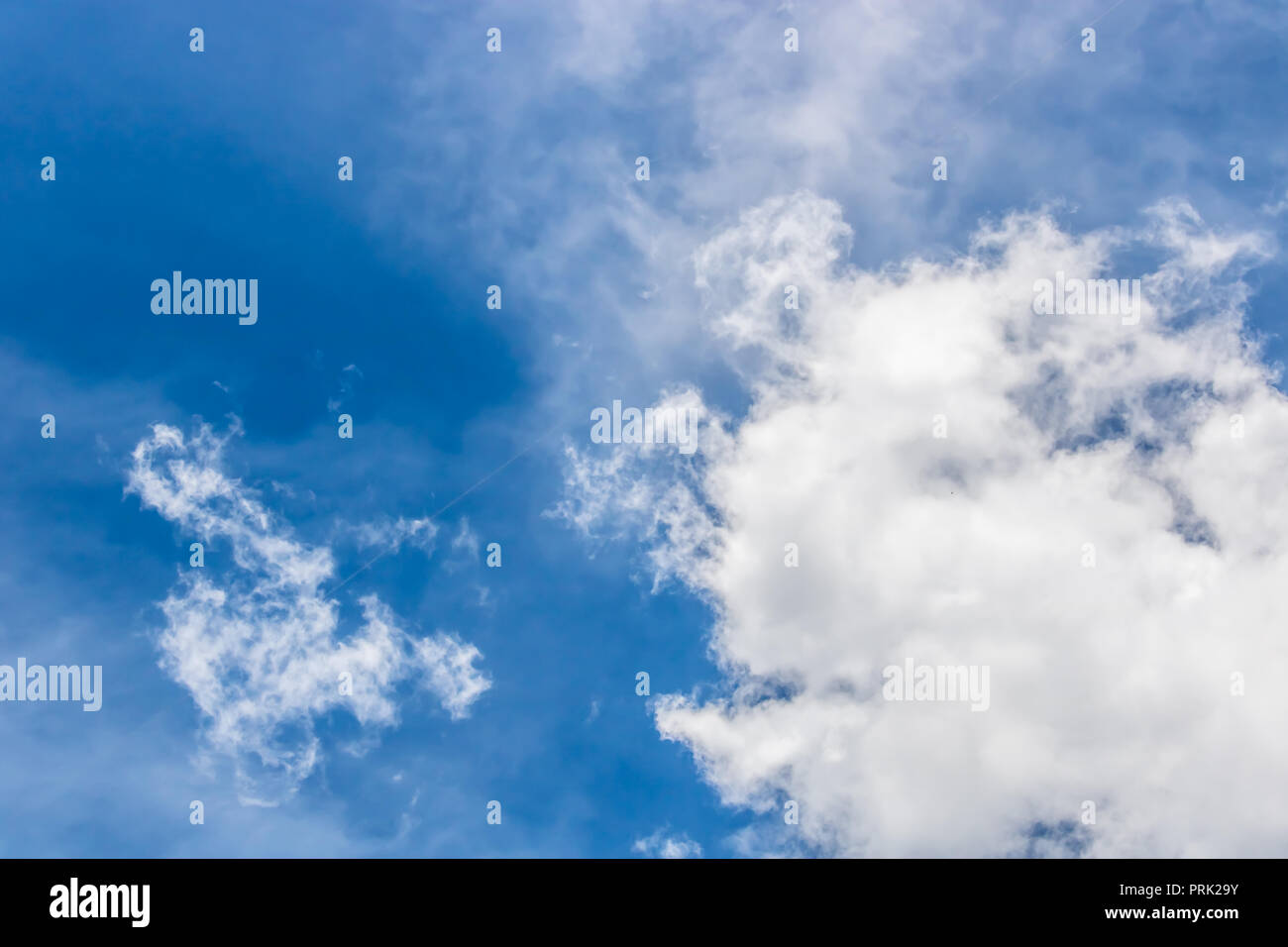 White Clouds in Blue Sky at Noon Stock Photo - Alamy