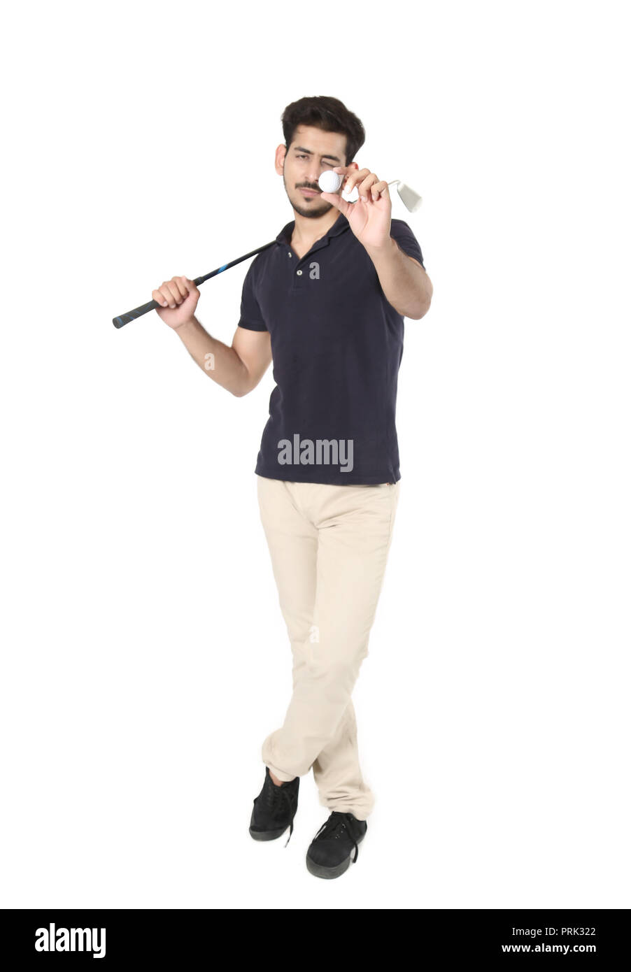 Handsome boy with golf stick and golf ball in picture. Isolated on ...