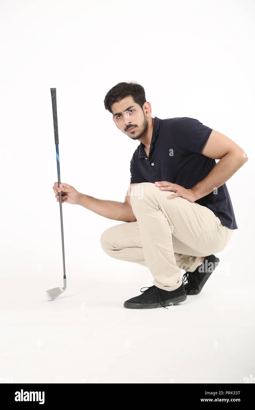 Picture of handsome boy holding golf stick in hand. Isolated on white ...