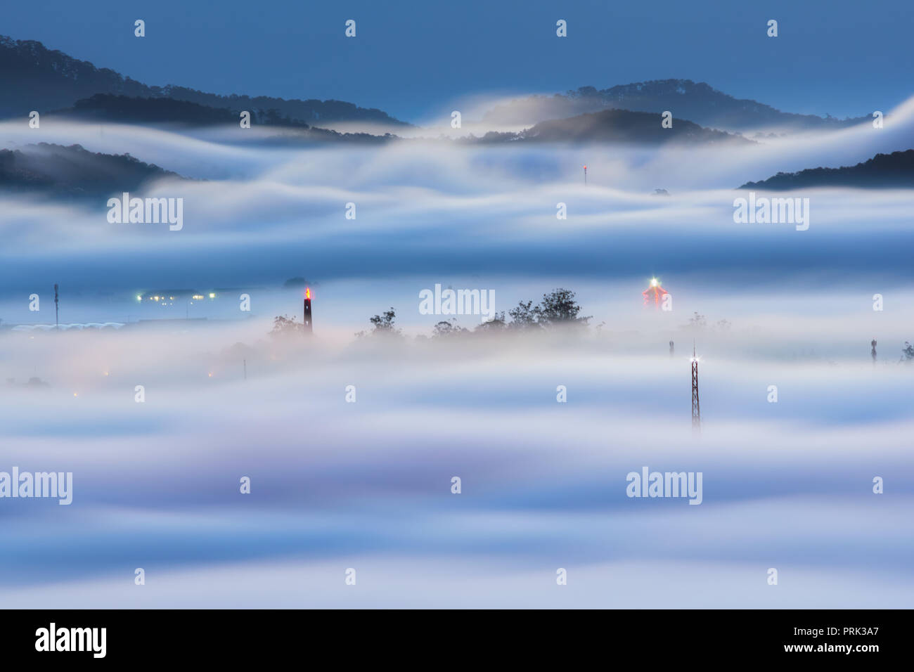The fog cover Dalat plateau lands, Vietnam, background with magic of ...