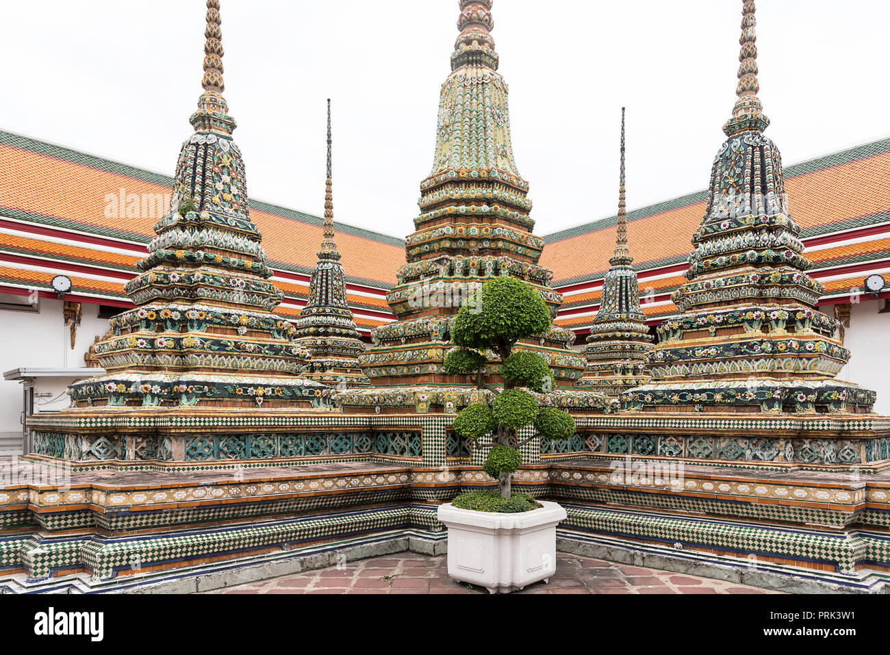 Exterior of Wat Pho temple in Bangkok with decorated patterned stupas ...