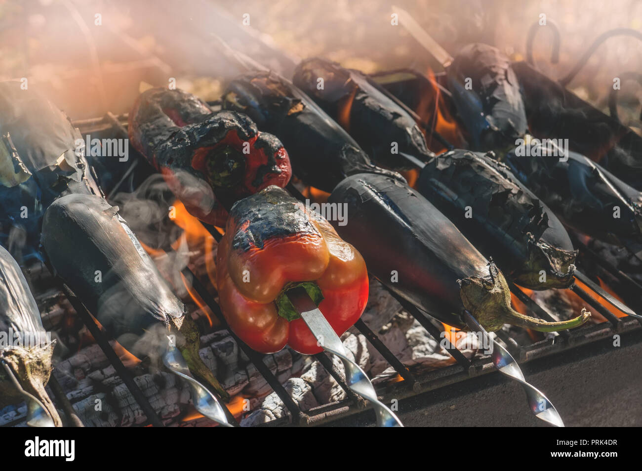 Grilled vegetables are baked to prepare an Oriental dish. Peppers ...