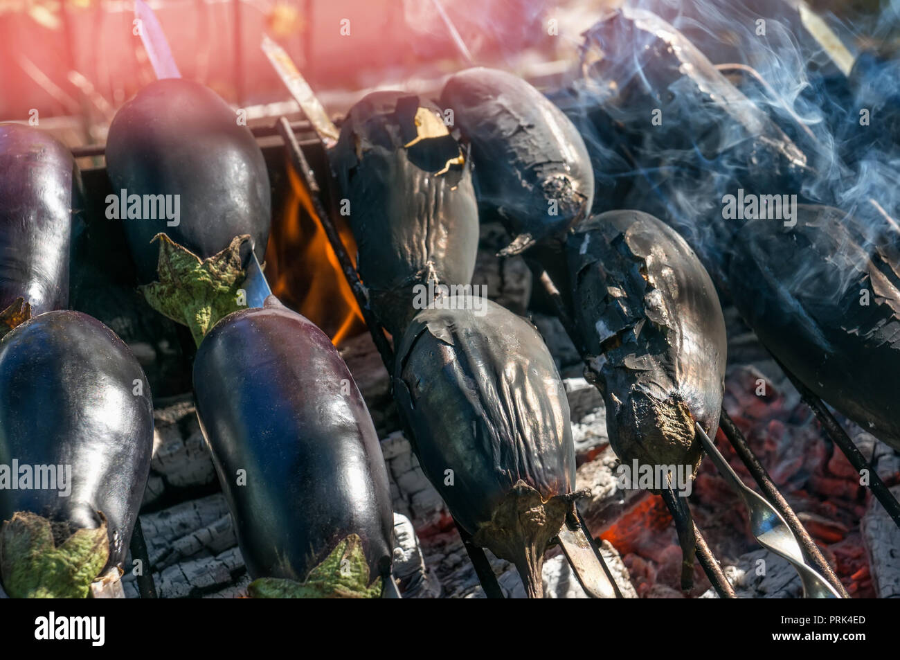 Grilled vegetables are baked to prepare an Oriental dish. Peppers ...