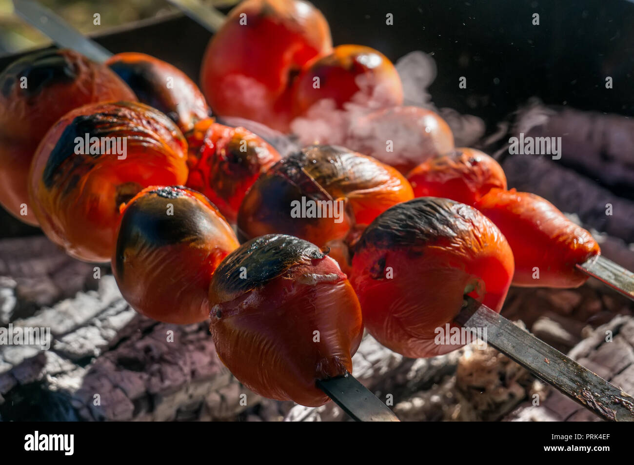 Grilled vegetables are baked to prepare an Oriental dish. Peppers ...