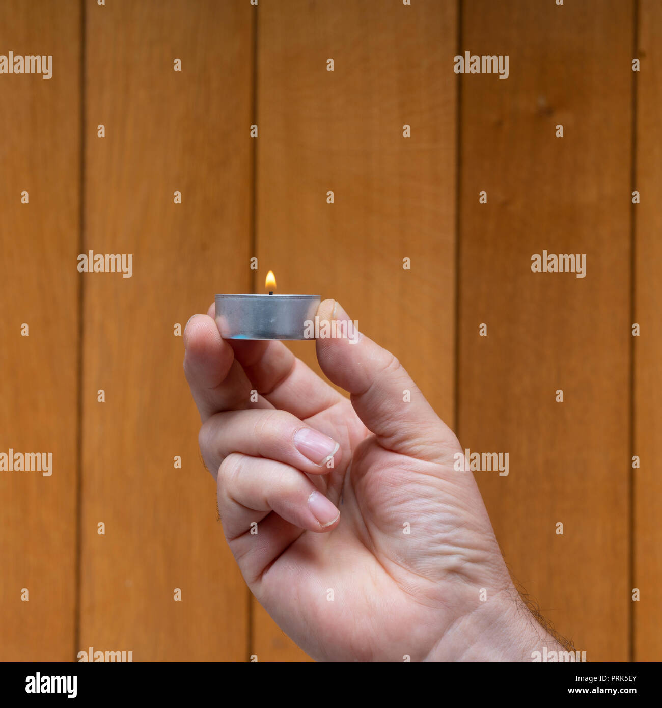 Small candle hi-res stock photography and images - Alamy