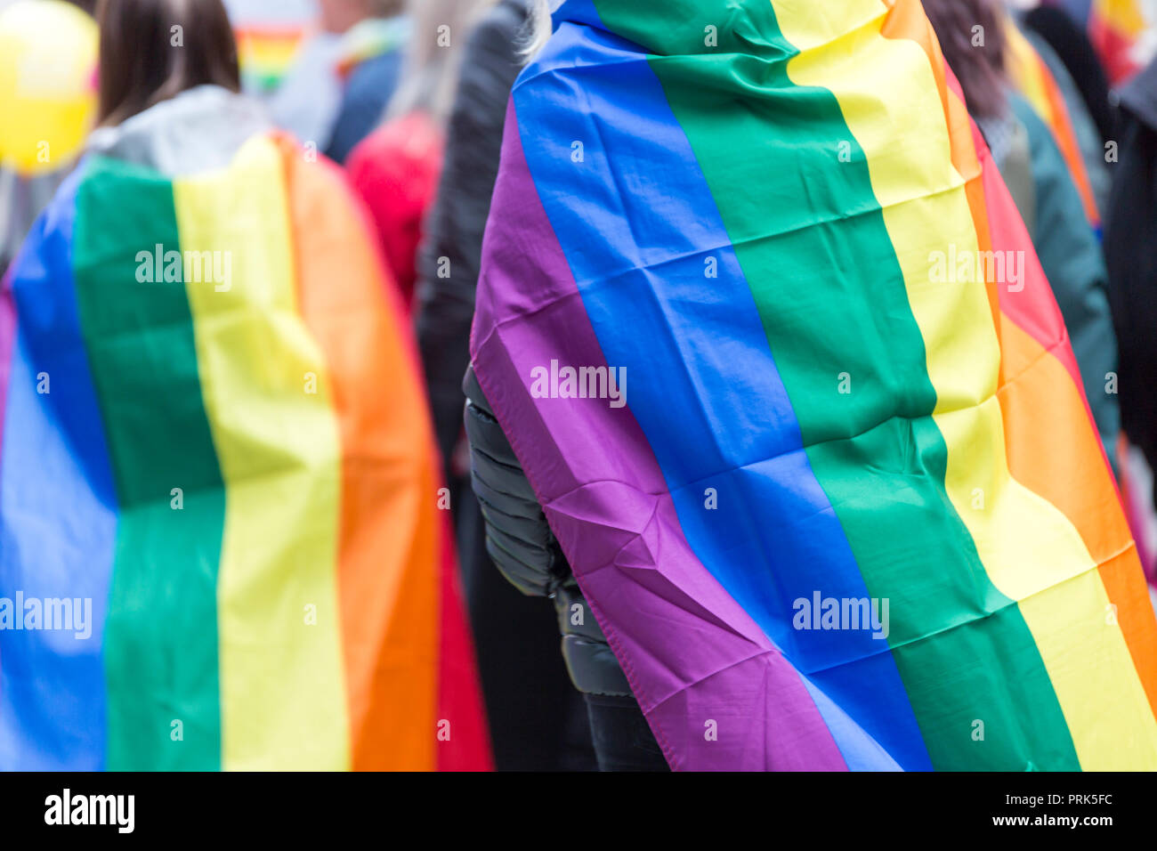 Person Carrying Rainbow Flag over Sholders in Pride Parade Stock Photo ...