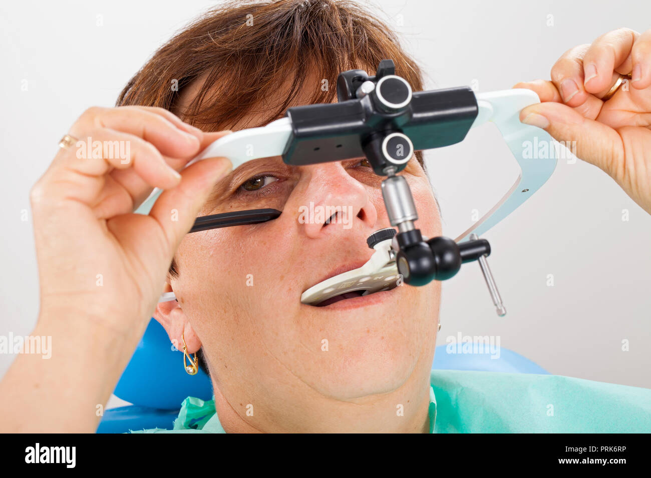 Seniorpatient wearing a facebow for transfer functional and aesthetic ...