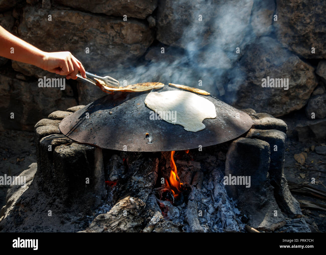 Turning the bread hi-res stock photography and images - Alamy