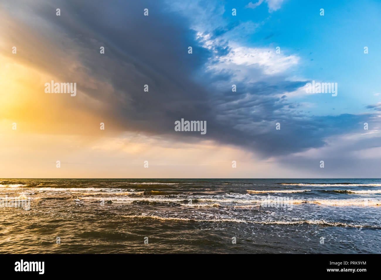 Ocean waves overcast sky dusk hi-res stock photography and images - Alamy