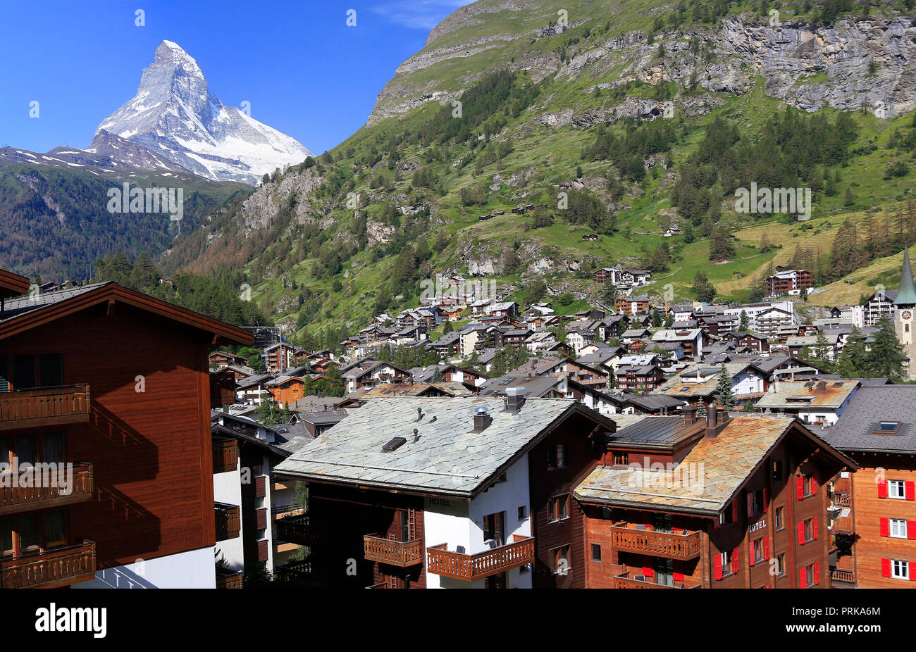 Zermatt famous ski and hiking resort with chalets and Matterhorn on the ...