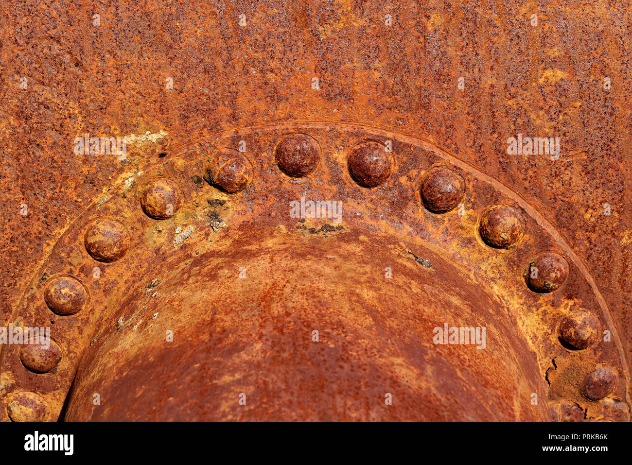 Backgrounds and textures: rusty metal wall surface with riveted joints ...