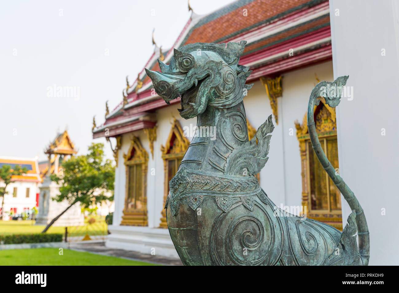 Singha or the lion statue in front of Thai temple represent the ...