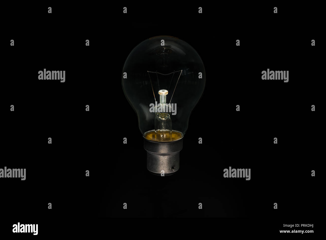 The electric light buld without light on the black background Stock ...