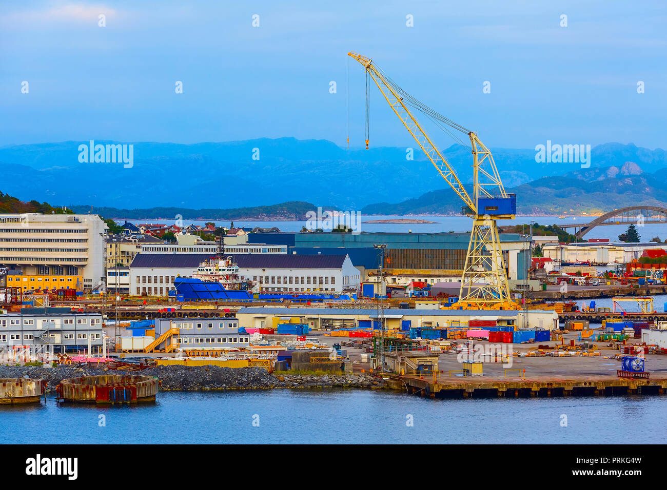 Heavy lifting crane vessel in cargo terminal of port harbour near ...