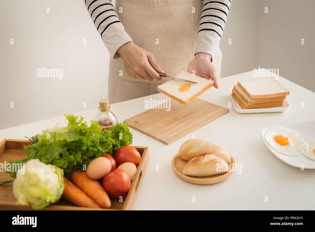 Hands man prepare breakfast hi-res stock photography and images - Alamy