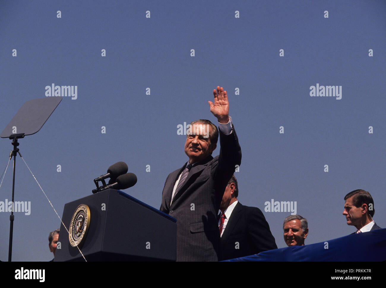 Former President Nixon waves at the opening of the Nixon Library on ...