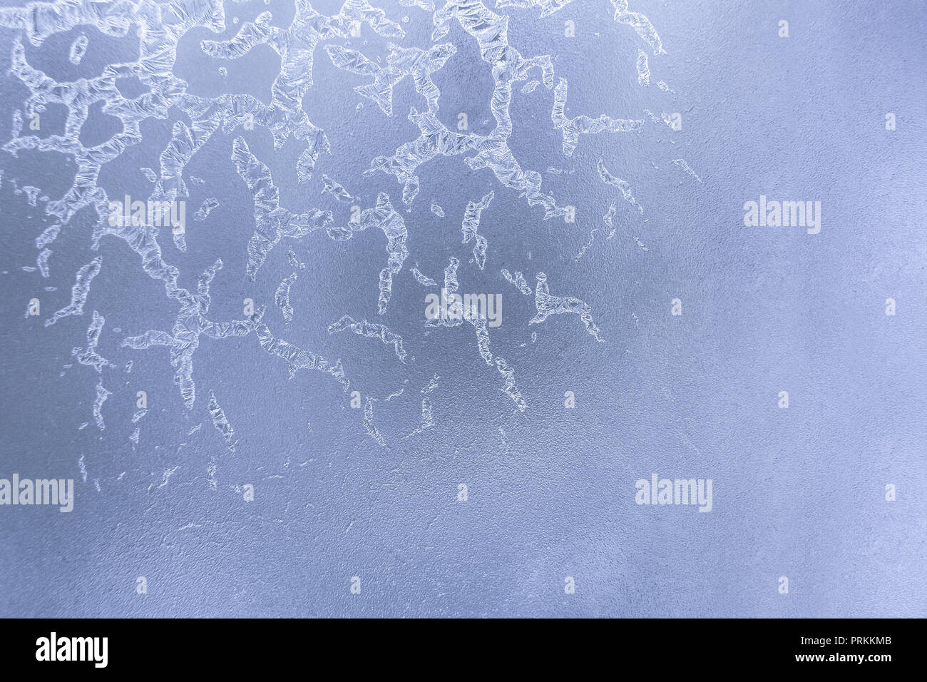Fancy drawing of elongated ice crystals on frozen winter window Stock ...